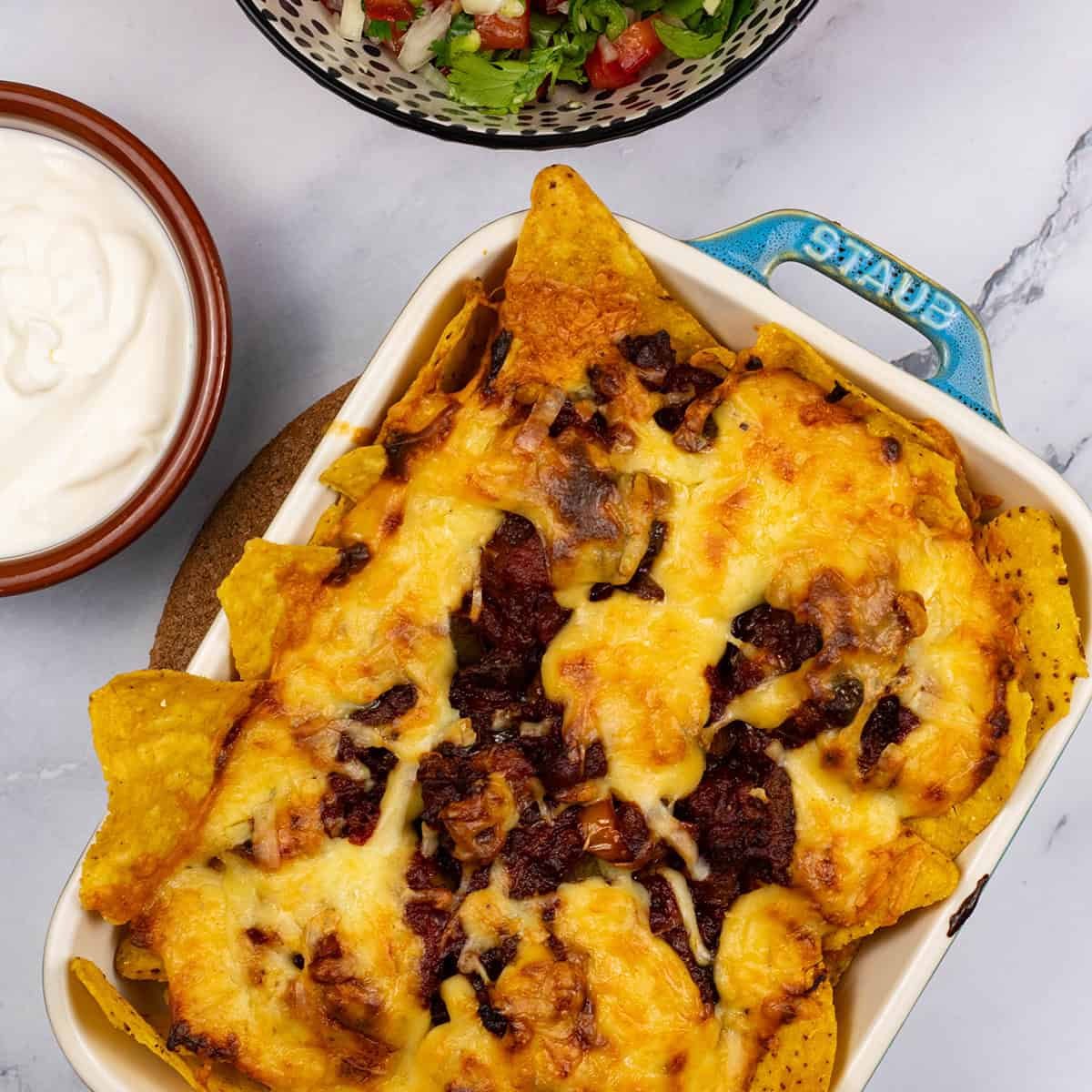 Party Nachos with Chorizo and Spicy Cheese Sauce - Felly Bull